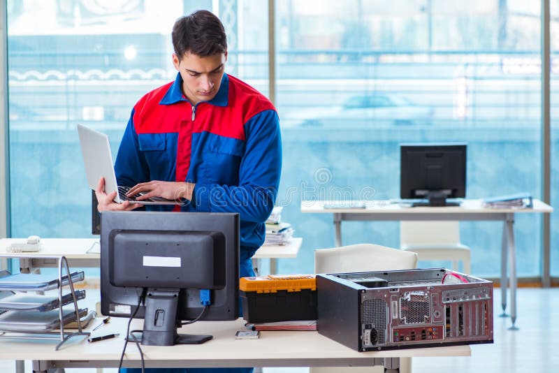 The Computer Technician Repairing Broken Computer in Workshop Stock ...