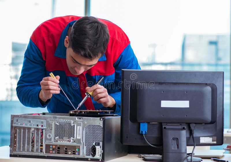 Computer Technician Repairing Broken Computer in Workshop Stock Photo ...