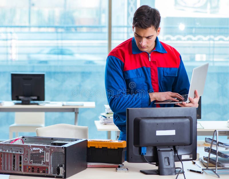Computer Technician Repairing Broken Computer in Workshop Stock Photo ...