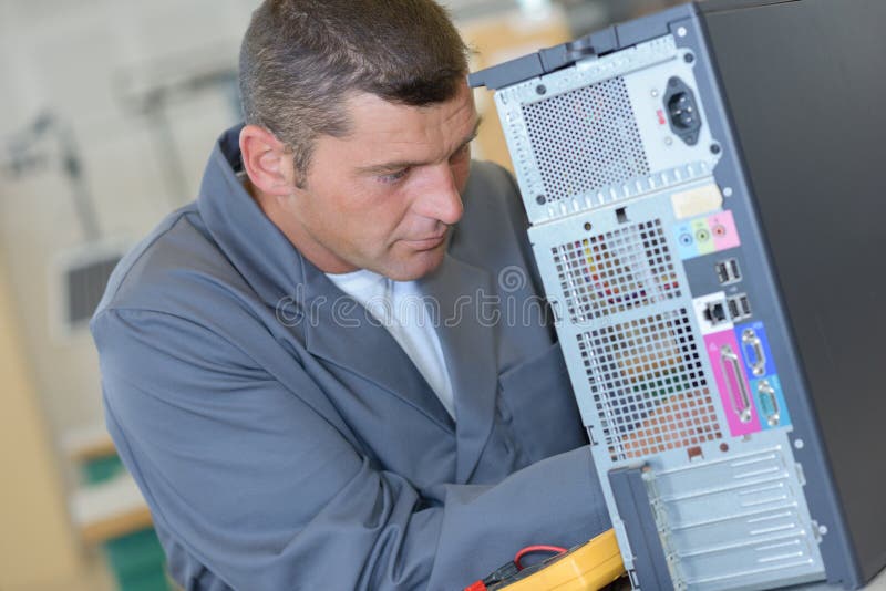Computer Technician at Work Stock Image - Image of comptuter, techie ...
