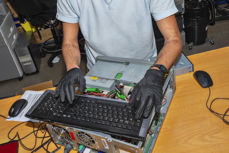 Computer Technician Working in Workshop Stock Image - Image of ...