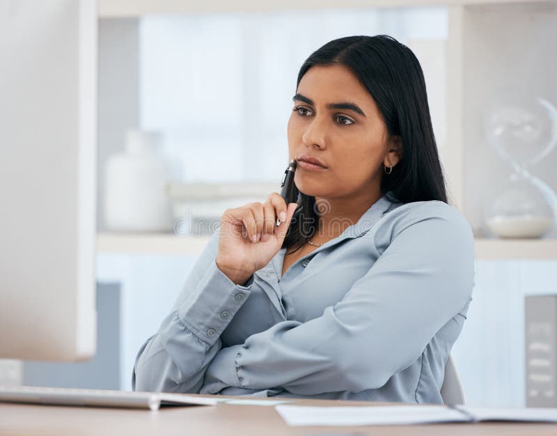 Computer, Thinking and Idea with a Business Woman at Work Alone at a ...