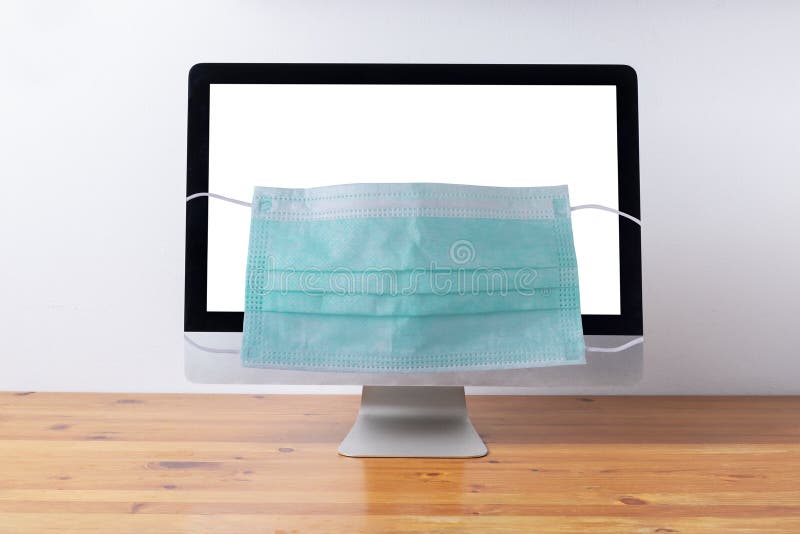 Computer White Screen on Table Wood with Protective Face Mask Stock ...