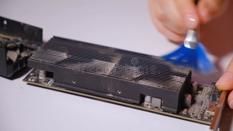 Computer Wizard Brushes the Video Card from Dust. Stock Footage - Video ...