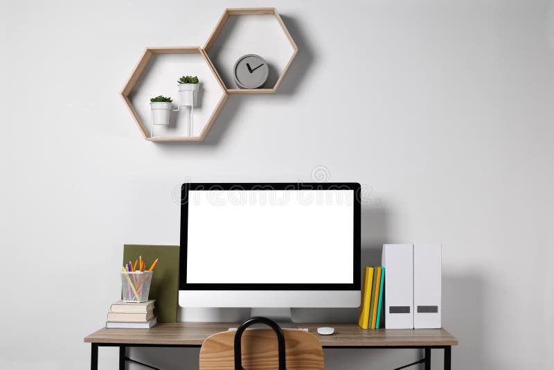 Cozy Workspace with Laptop, Houseplants and Stationery on Wooden Desk ...