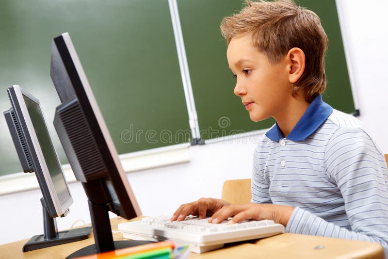 Kid using computer stock image. Image of college, computer - 9374997
