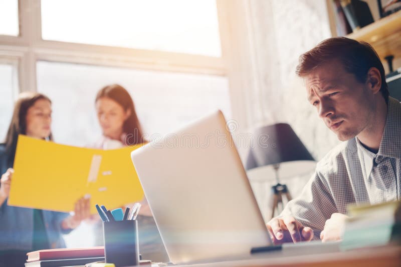 Computer Work in Loft Office. Typing with Laptop and Business Employees ...