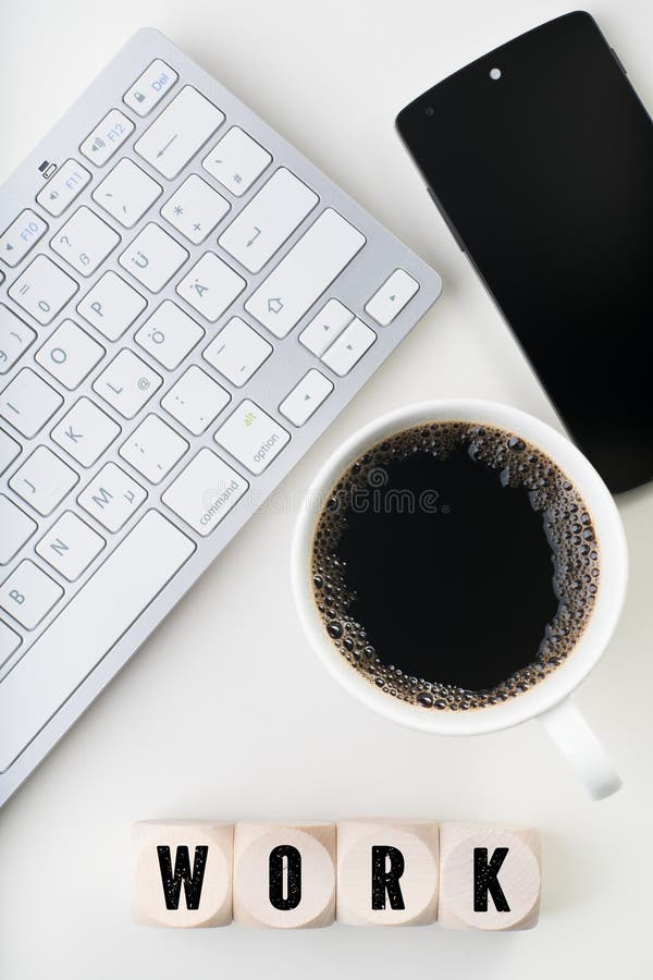 Computer Work Space with Coffee and Cubes with the Word WORK Stock ...