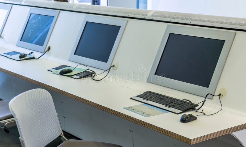 Computer Workstations in a Modern Library Stock Image - Image of desk ...