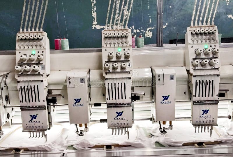 Computerized Embroidery Knitting Machines Deals a Design in Fabric ...