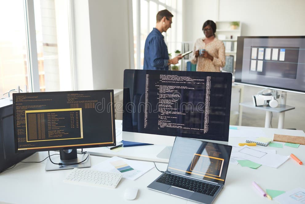 Computers with Code on Screen in it Office Stock Photo - Image of ...
