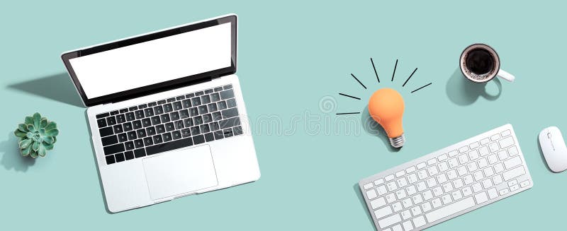 Computers with a Light Bulb Stock Image - Image of tech, work: 211768681
