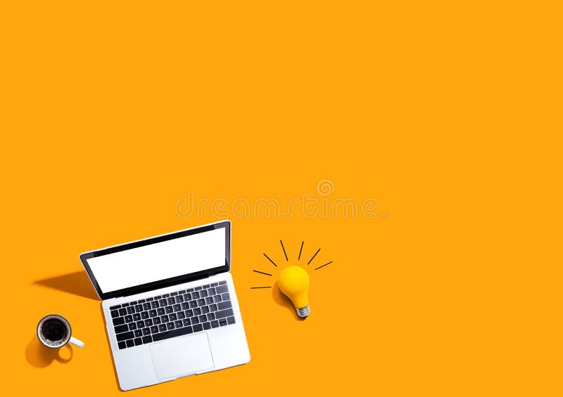 Computers with a Light Bulb Stock Image - Image of light, office: 255220685