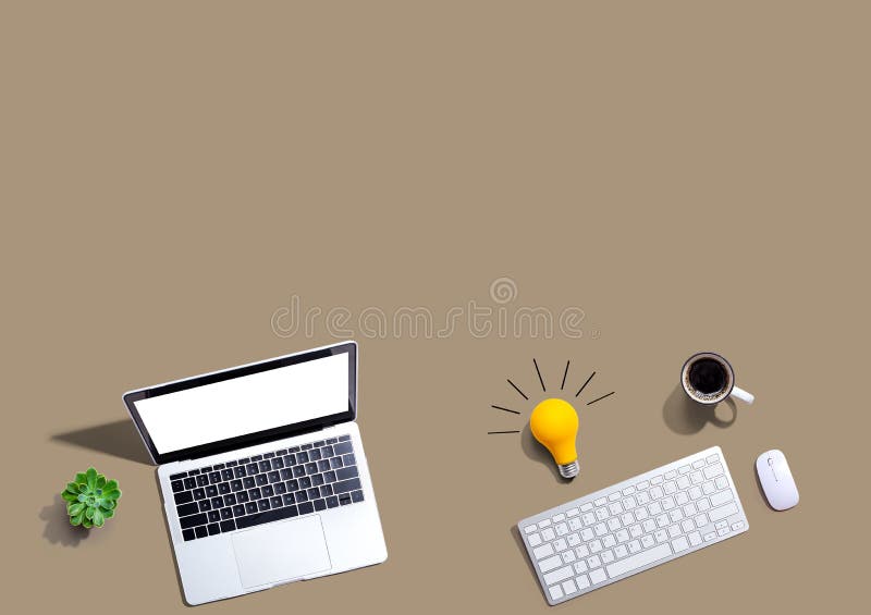 Computers with a Light Bulb Stock Photo - Image of power, laptop: 257208410