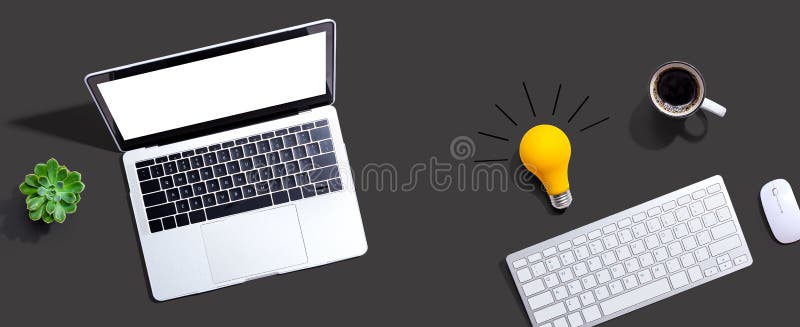 Computers with a Light Bulb Stock Photo - Image of solution, computer ...