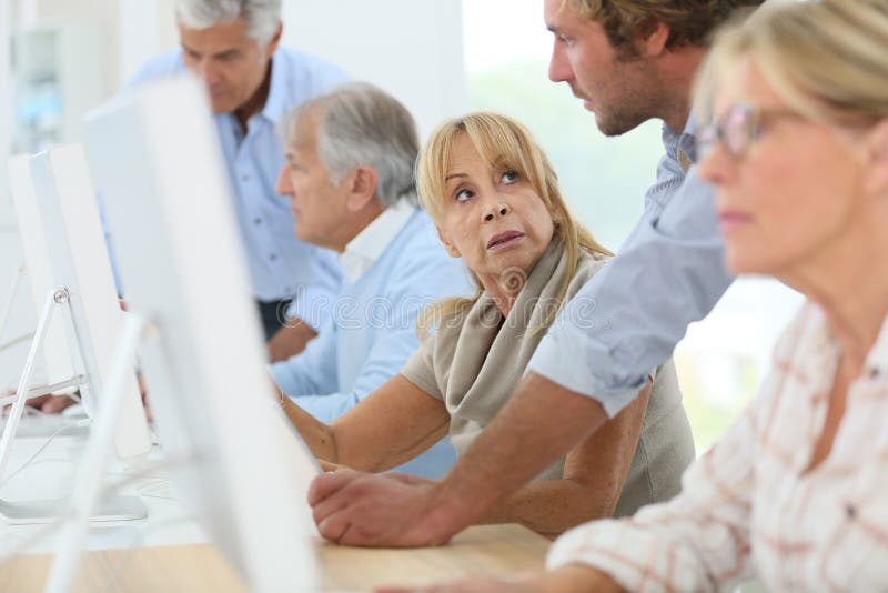 Computing Training of Seniors with Instructor Stock Image - Image of ...