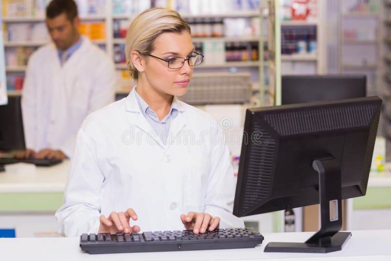 Concentrate Pharmacist Using Computer Stock Image - Image of ...