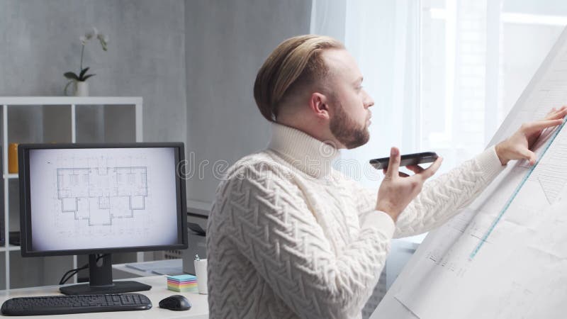 Architect Works in Loft Using Drawing Board. Workplace of Young and ...