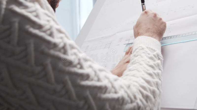 Architect Works in Loft Using Drawing Board. Workplace of Young and ...