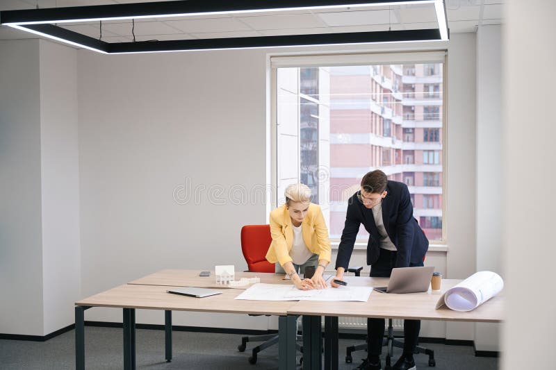 Architects Drawing Building Plan in the Office Stock Photo - Image of ...