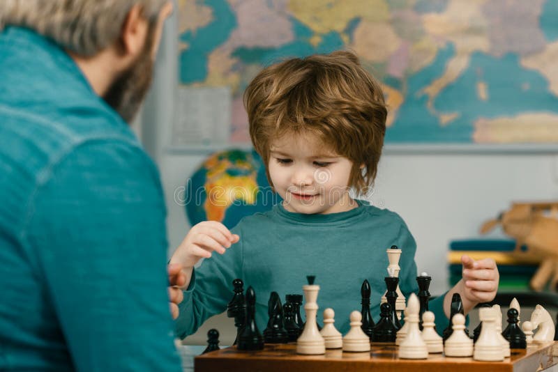 Concentrated Boy Developing Chess Strategy, Playing Board Game. Child ...