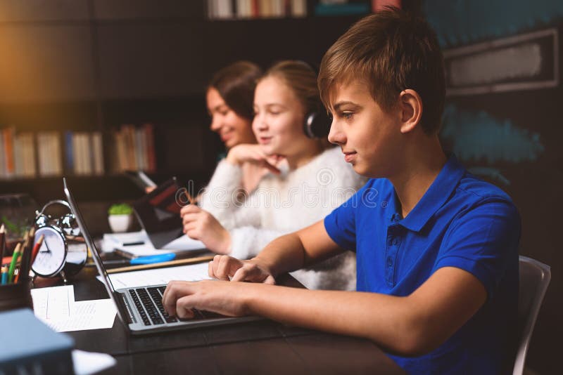Concentrated Boy Typing on His Laptop Stock Image - Image of happy ...
