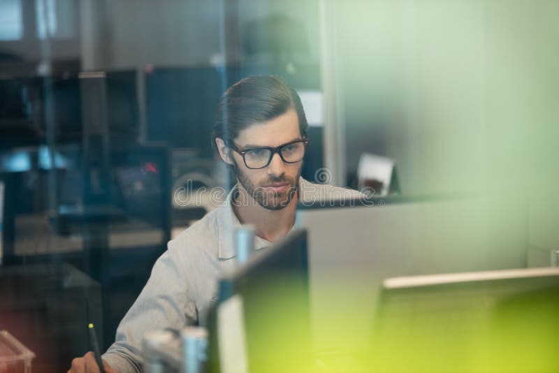 Concentrated Businessman Working on Computer at Office Stock Photo ...
