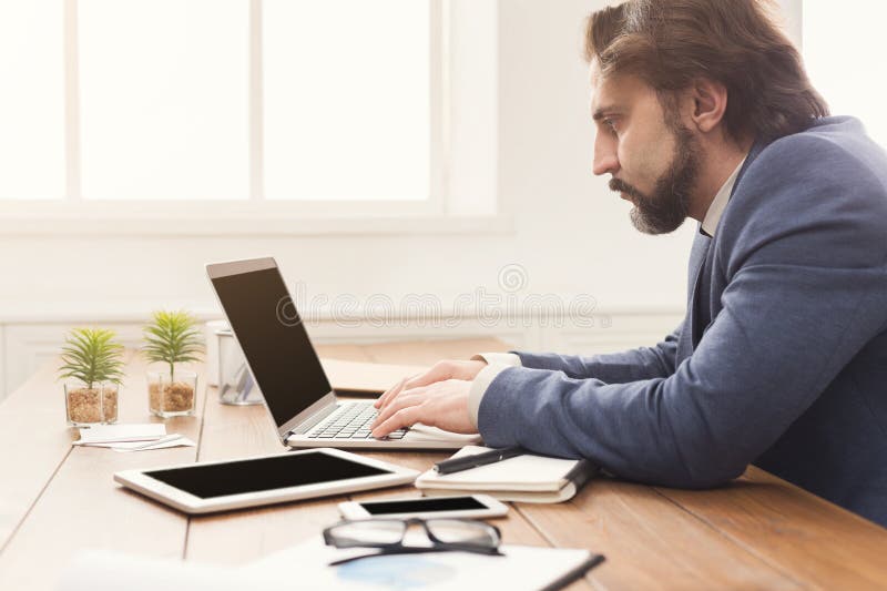 Concentrated Businessman Working with Laptop Stock Photo - Image of ...
