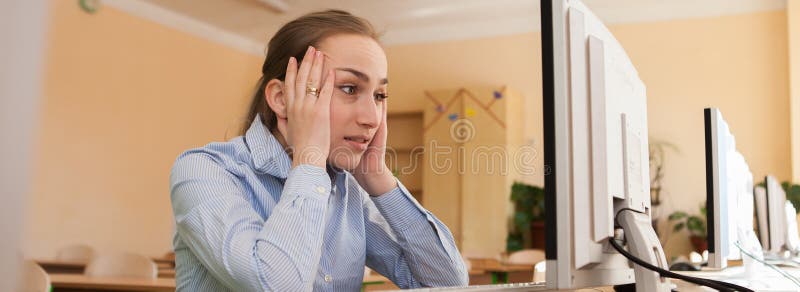 Concentrated Businesswoman Trying To Solve a Difficult Assignment on ...