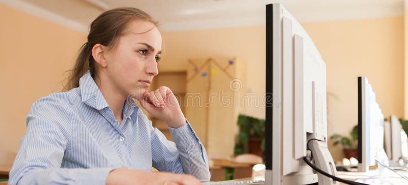 Concentrated Businesswoman Trying To Solve a Difficult Assignment on ...