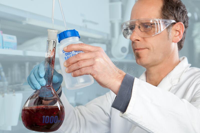 Concentrated chemist work stock photo. Image of laboratory - 37001694