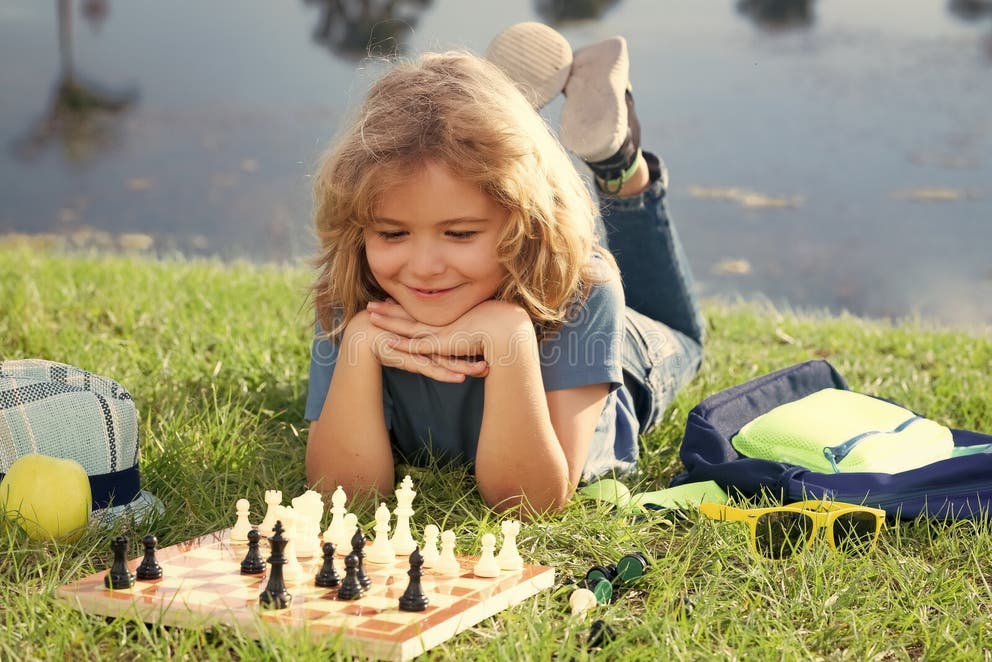Concentrated Child Boy Developing Chess Strategy, Playing Board Game in ...