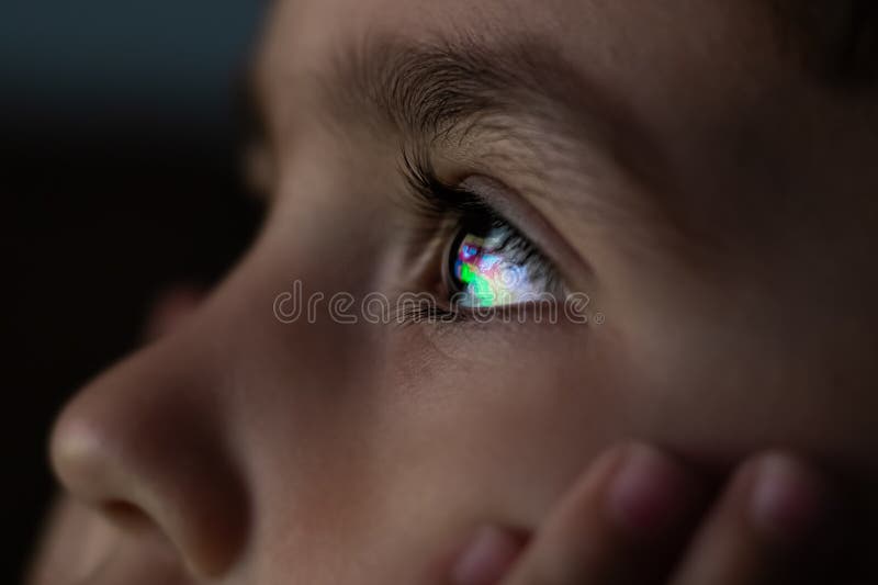 Concentrated Child Watching Something on a Screen Stock Photo - Image ...
