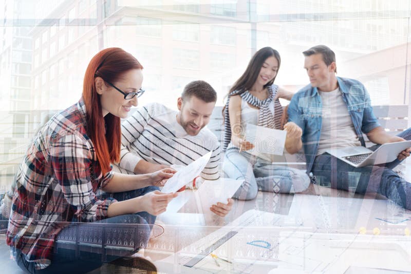 Concentrated Engineers Having a Look at Sketches Stock Photo - Image of ...