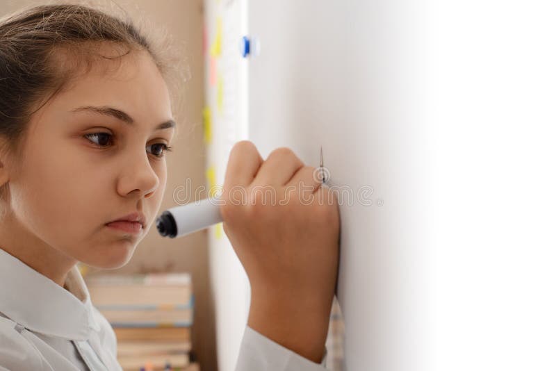 Concentrated Female Learner Writing on the Whiteboard Stock Image ...
