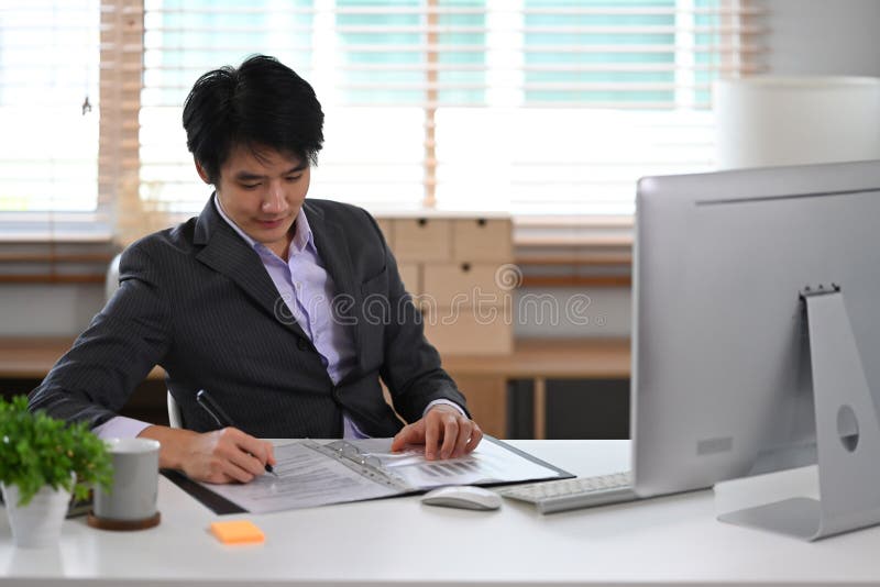 Financial Advisor Working with Computer at Bright Modern Office. Stock ...