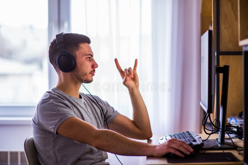 Positive Guy Playing Game on Desktop Computer Stock Photo - Image of ...