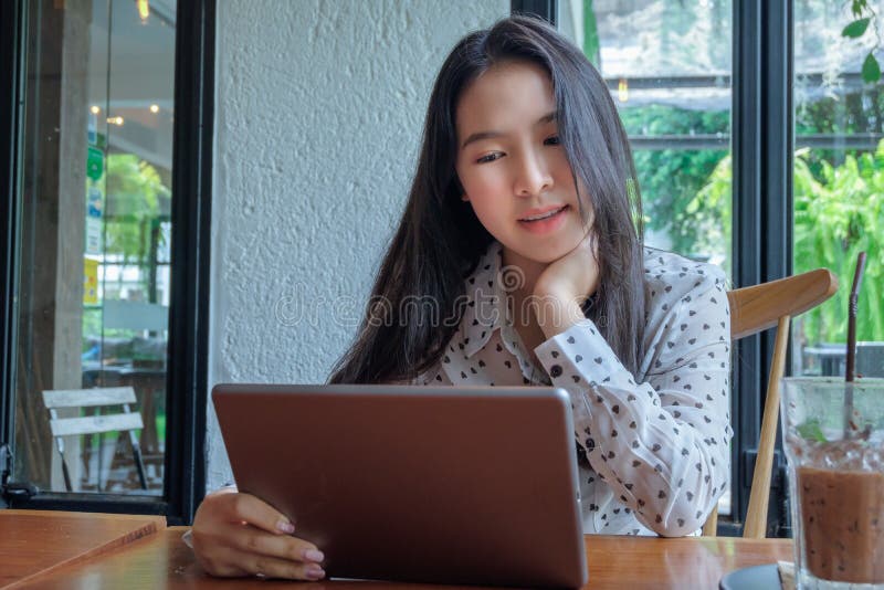 Girl Smiling while Typing on Computer. Stock Image - Image of modern ...