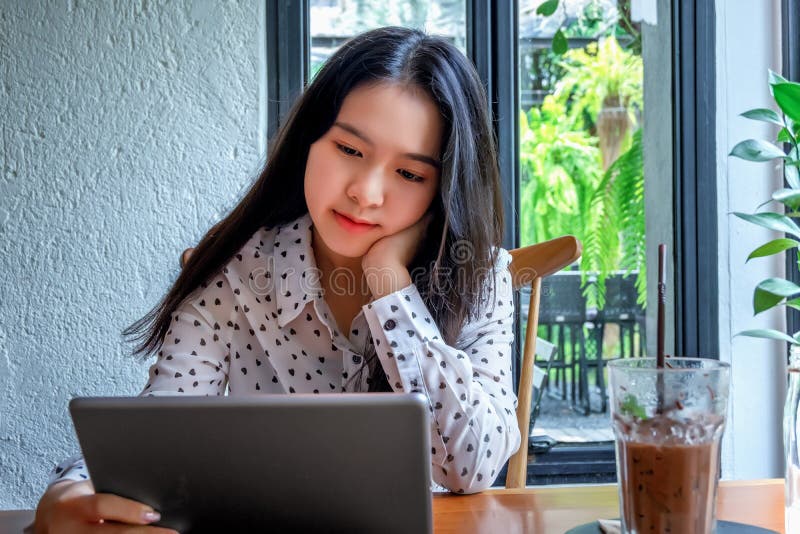Girl Smiling while Typing on Computer. Stock Photo - Image of female ...