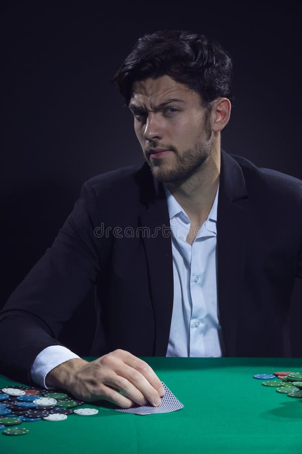 Concentrated Handsome Caucasian Brunet Young Pocker Player at Pocker ...