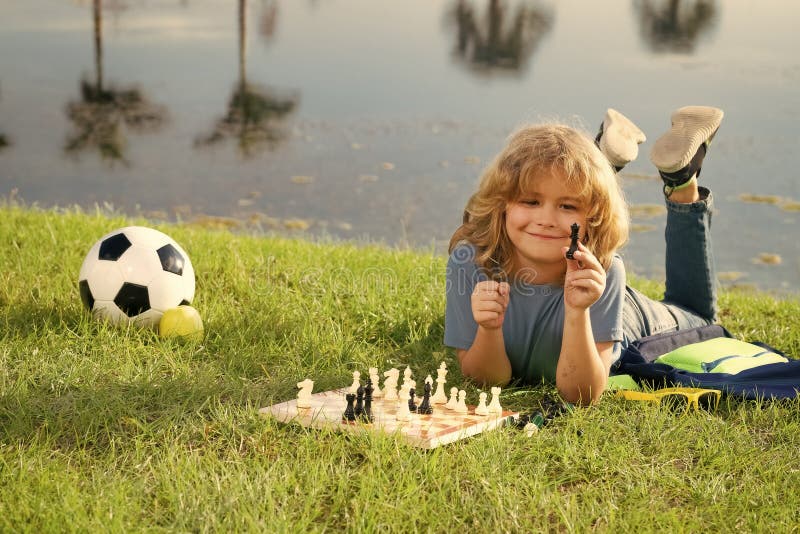 Concentrated Kid Developing Chess Strategy, Playing Board Game in ...