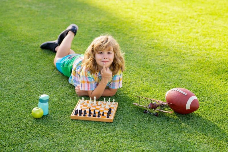 Concentrated Kid Developing Chess Strategy, Playing Board Game in ...
