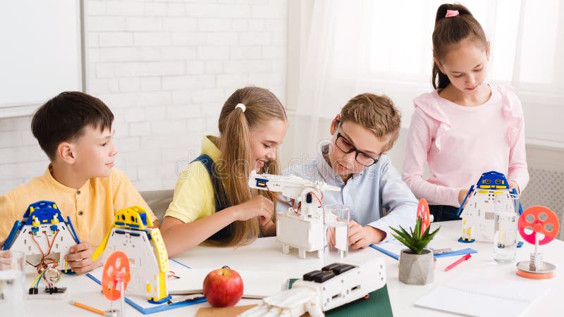 Concentrated Kids Constructing Robots at Stem Class Stock Image - Image ...
