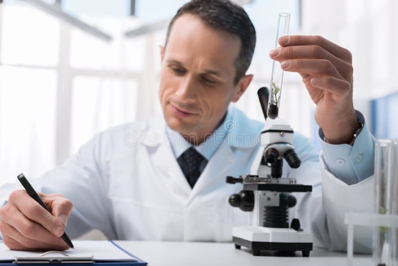 Lab Technician Taking Notes Stock Image - Image of scientist ...