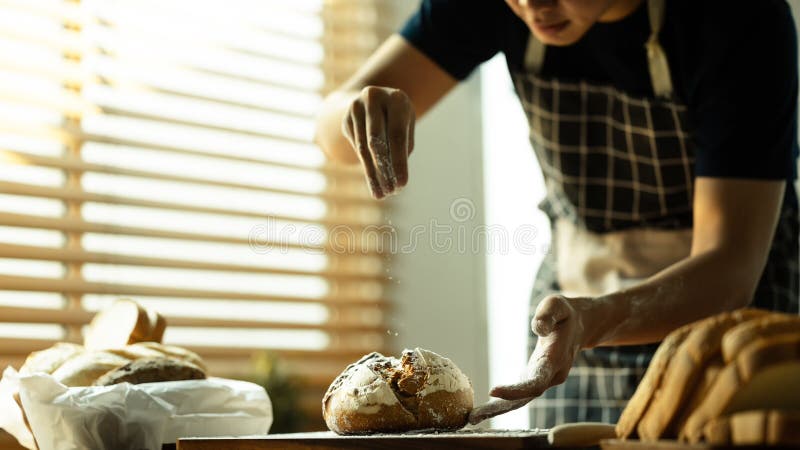 Concentrated Male Baker Sprinkling Flour on Dough, Prepares Bread in ...