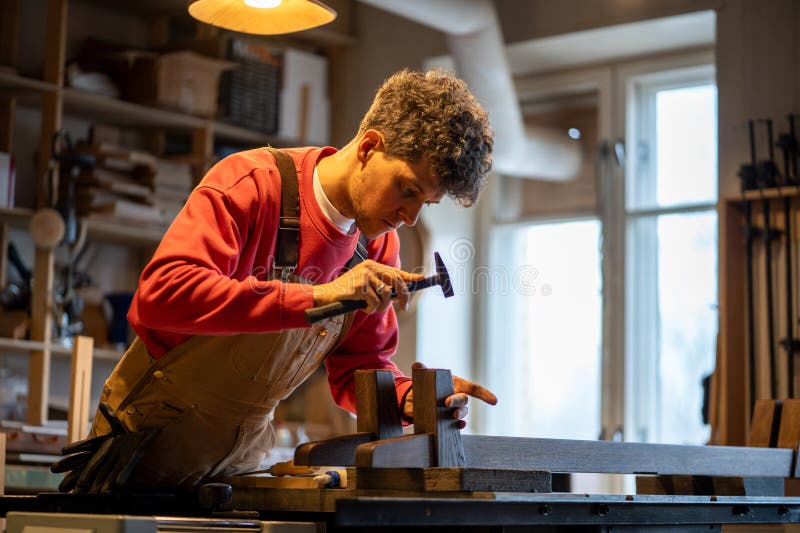 Unsmiling Guy Joiner Working at Workplace Workshop for Small Business ...