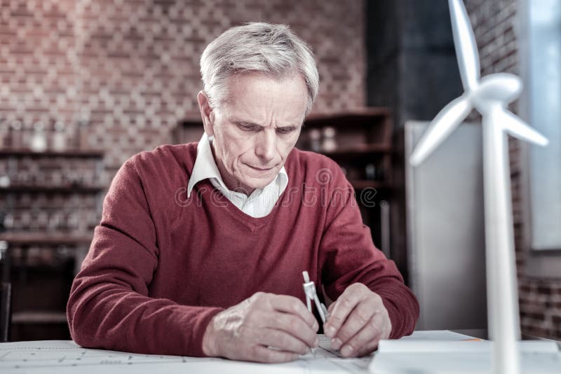 Concentrated Male Engineer Using Compasses Stock Image - Image of ...