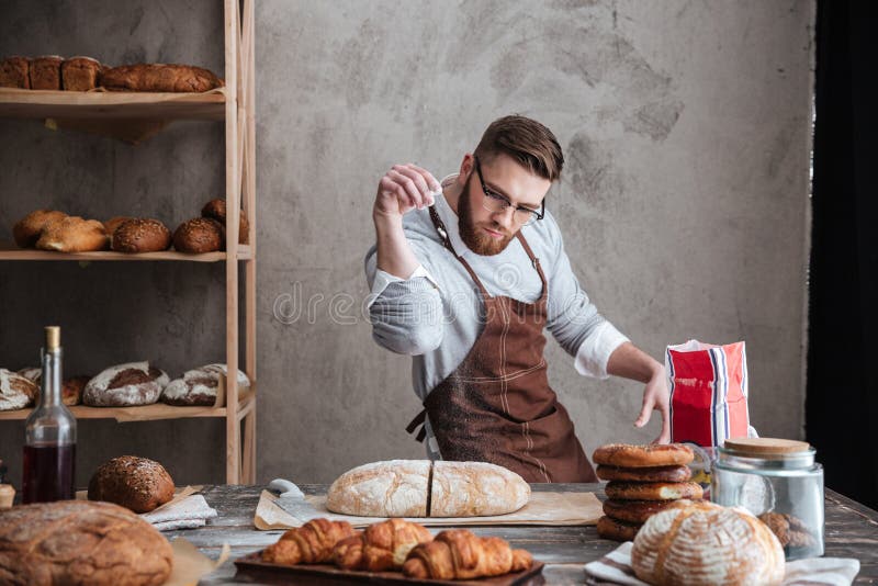Male baker baking bread stock photo. Image of bakehouse - 23952112