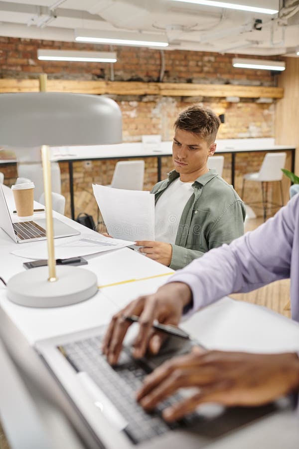 Concentrated Man Checking Documents in Working Stock Photo - Image of ...