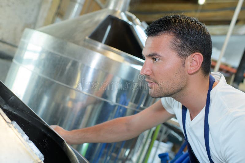 Concentrated Man Checking Work Results on Beer Factory Stock Image ...